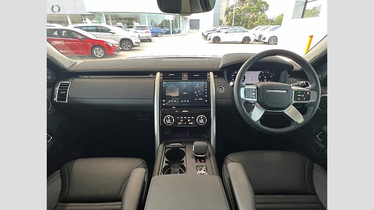 2024 Approved Land Rover Discovery Fuji White Gear Shift Paddles behind ...